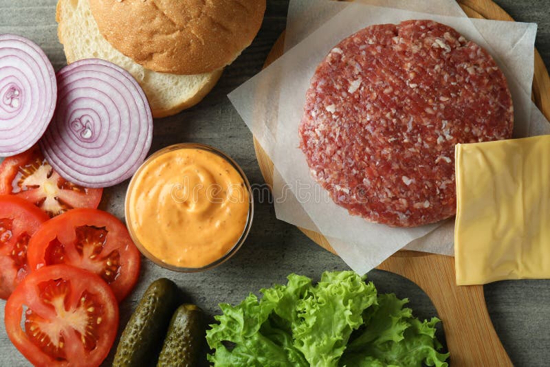Concept of Cooking Burger on Gray Textured Table Stock Photo - Image of ...