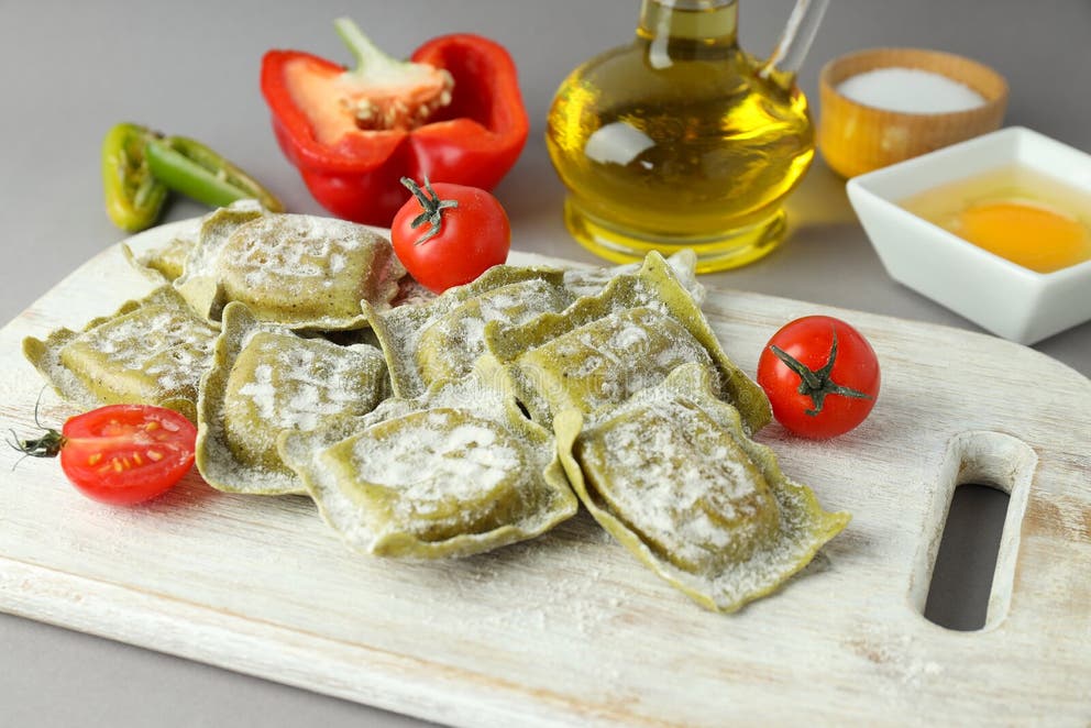 Concept of Cooking Ravioli on Light Gray Background Stock Image - Image ...