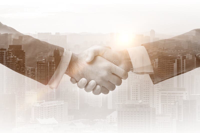 The Concept of Cooperation with Handshake Stock Image - Image of ...