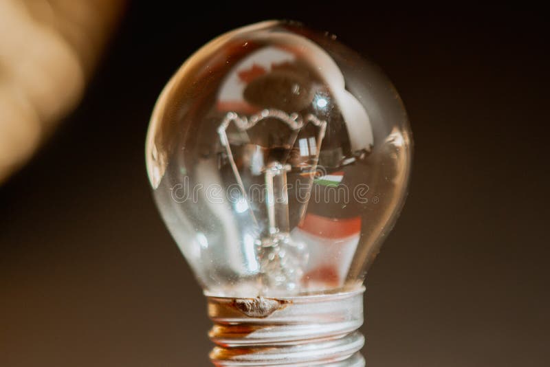 Concept Crisis of Electricity, Electric Light Bulb on Black Background ...