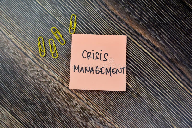 Concept of Crisis Management Write on Sticky Notes Isolated on Wooden ...