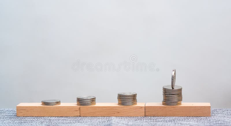 Money and Coins in Piles, the Amount Grows. the Concept of Saving and ...
