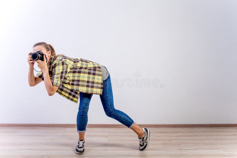 Different Photographer Poses: Bending, Squatting, Lying Down Stock ...