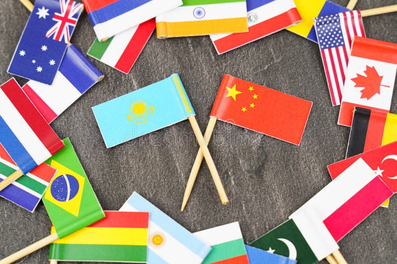 The Concept is Diplomacy. in the Middle among the Various Flags are Two ...