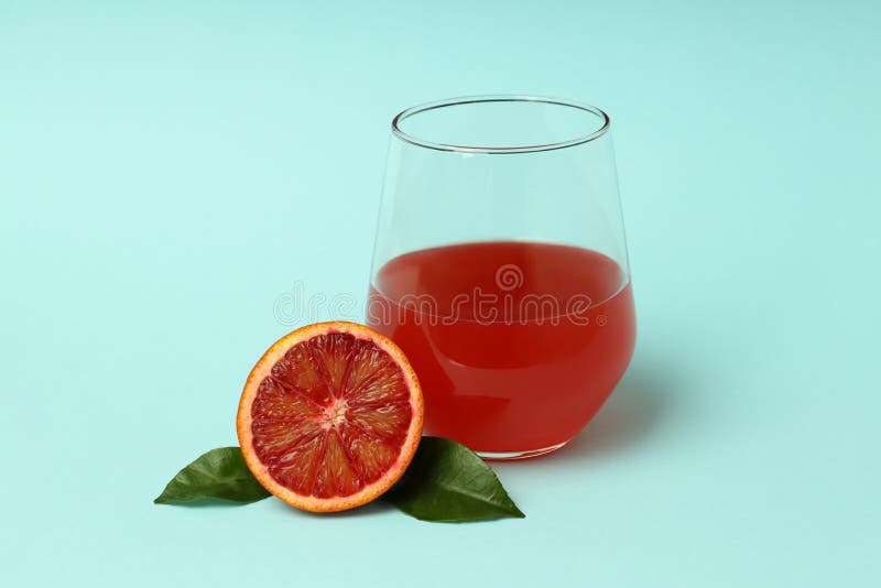 Concept of Drink, Red Orange Juice on Blue Background Stock Image ...
