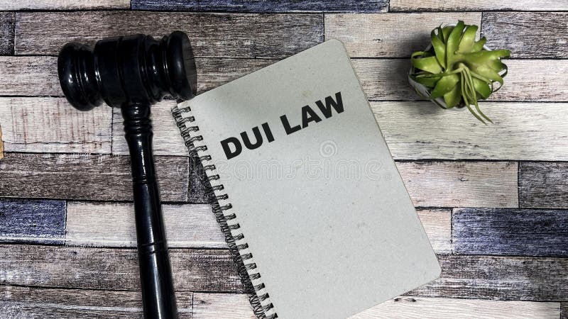 Concept of DUI LAW Write on Book Isolated on Wooden Table Stock Photo ...