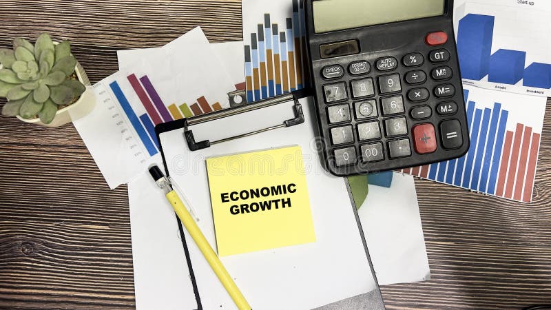 ECONOMIC GROWTH , Pen and Glasses on Chart, Business Concept Stock ...