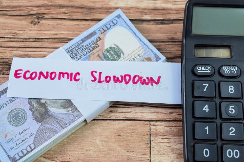 Concept of Economic Slowdown Write on Sticky Notes with Dollars ...