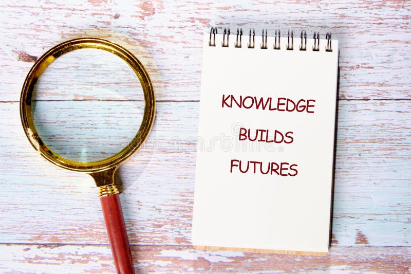 Concept of Education Emphasized through a Notebook and Magnifying Glass ...