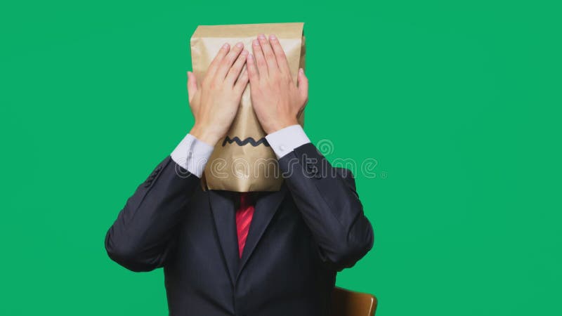 Concept of Emotion, Gestures. a Man with a Package on His Head, with a ...
