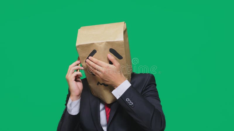 Concept of Emotion, Gestures. a Man with a Package on His Head, with a ...