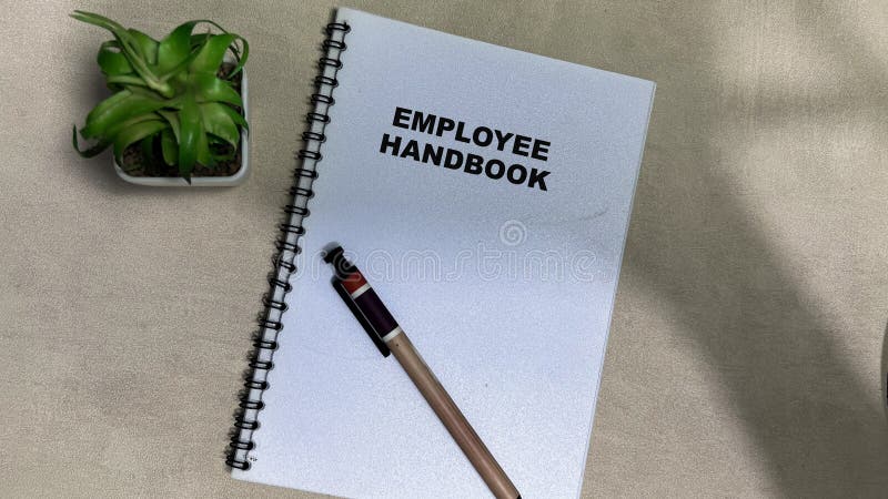 Concept of Employee Handbook Write on Book Isolated on Wooden Table ...