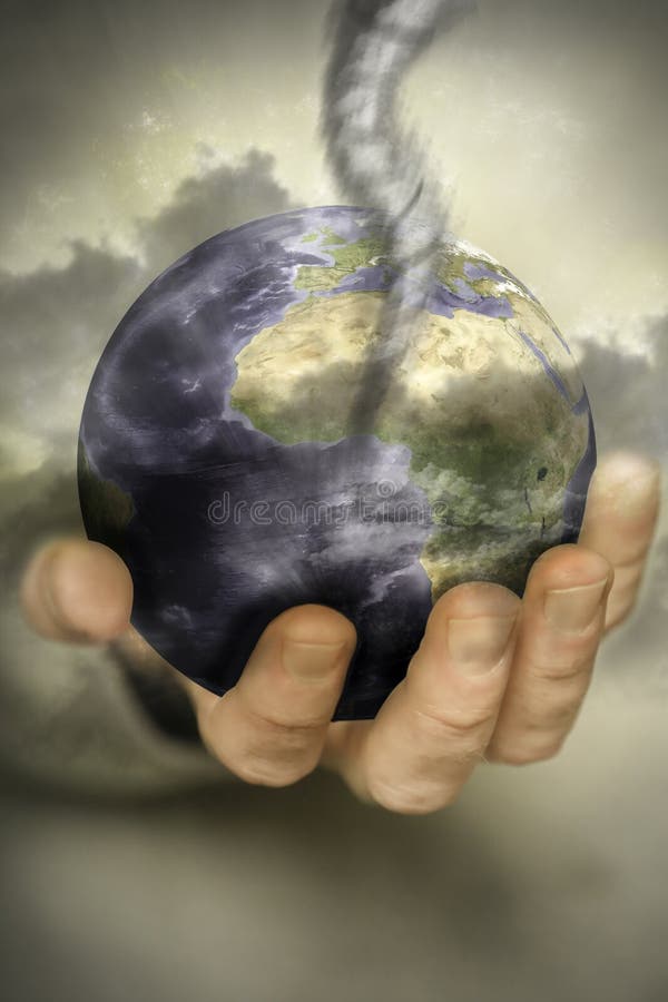 Hand Holding the Planet Earth, with Clouds and a Tornado Stock Photo ...