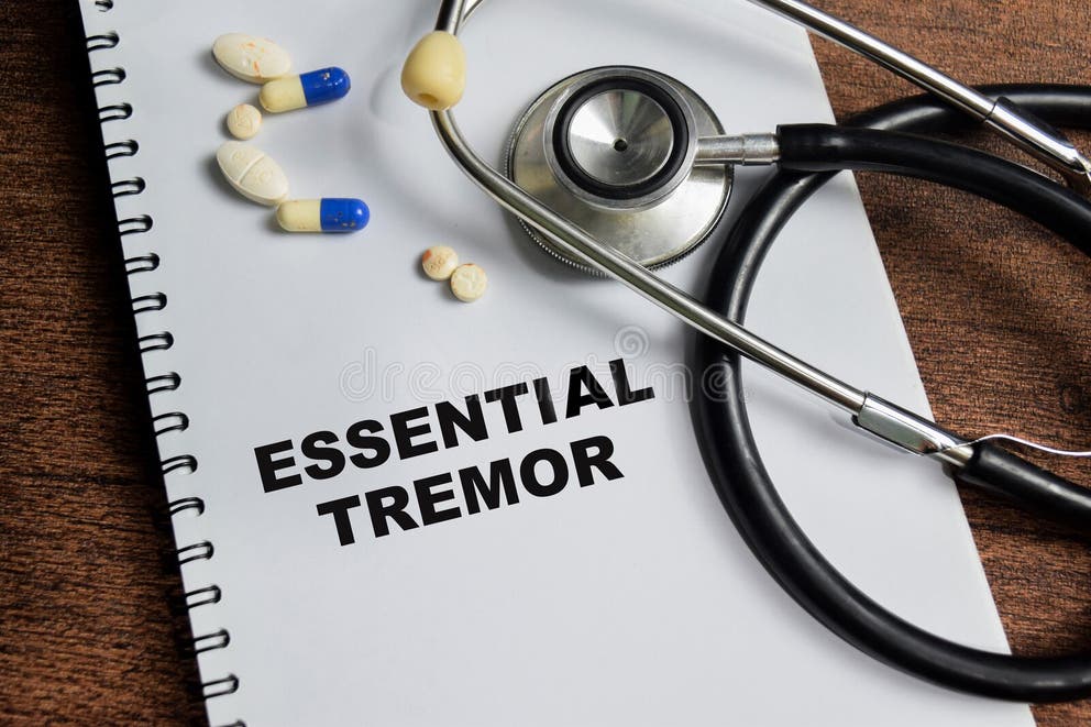 Concept of Essential Tremor Write on Book Isolated on Wooden Table ...
