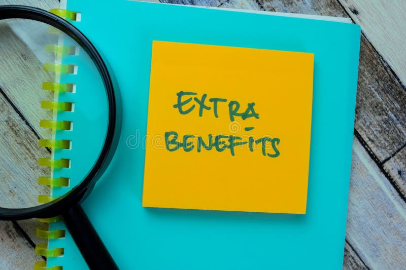 Concept of Extra Benefits Write on Sticky Notes Isolated on Wooden ...