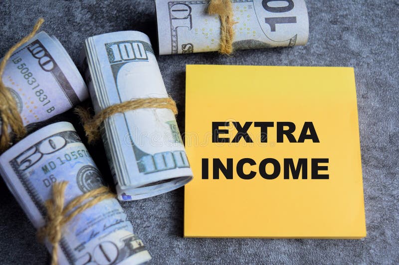 Extra Income is Shown Using the Text and Photo of Dollars Stock Image ...