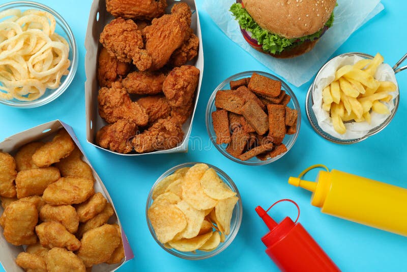 Concept of Fast Food on Blue Stock Photo - Image of grilled, cuisine ...