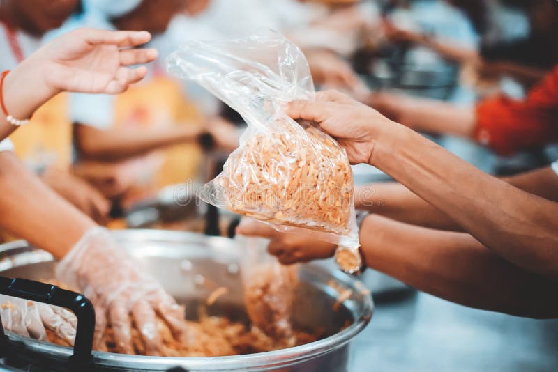 The Concept of Feeding : the Hands of the Poor Receive Food from the ...