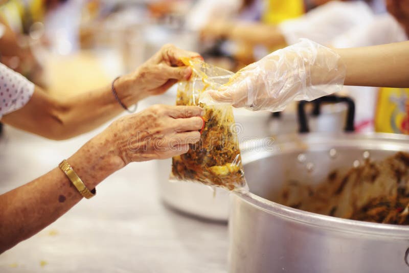 Concept of Feeding : Helping People with Hunger with Kindness Stock ...