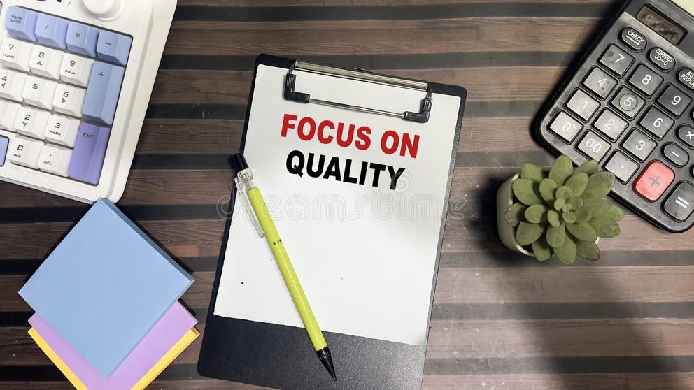 Concept of Focus on Quality Write on Paperwork Isolated on Wooden Table ...