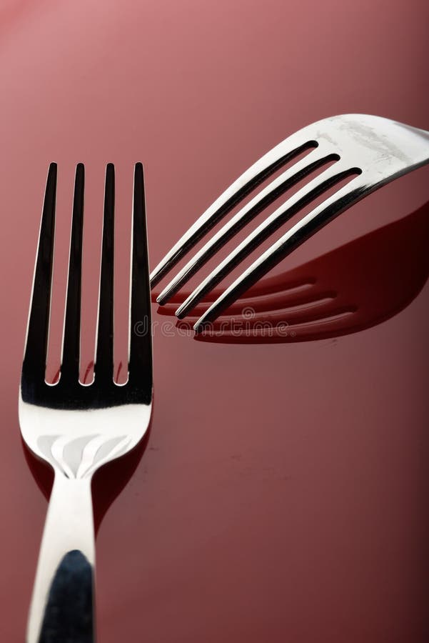 Concept with Fork on Red Background VI Stock Photo - Image of silver ...