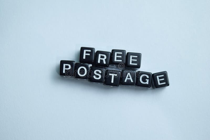 Concept of Free Postage Written on Wooden Blocks. Cross Processed Image ...