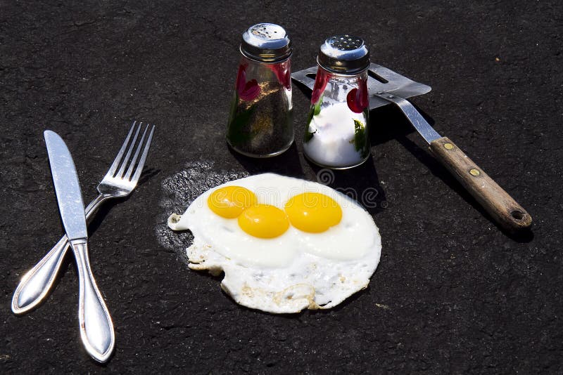 Concept - Frying Eggs Hot Asphalt Driveway Stock Image - Image of fork ...