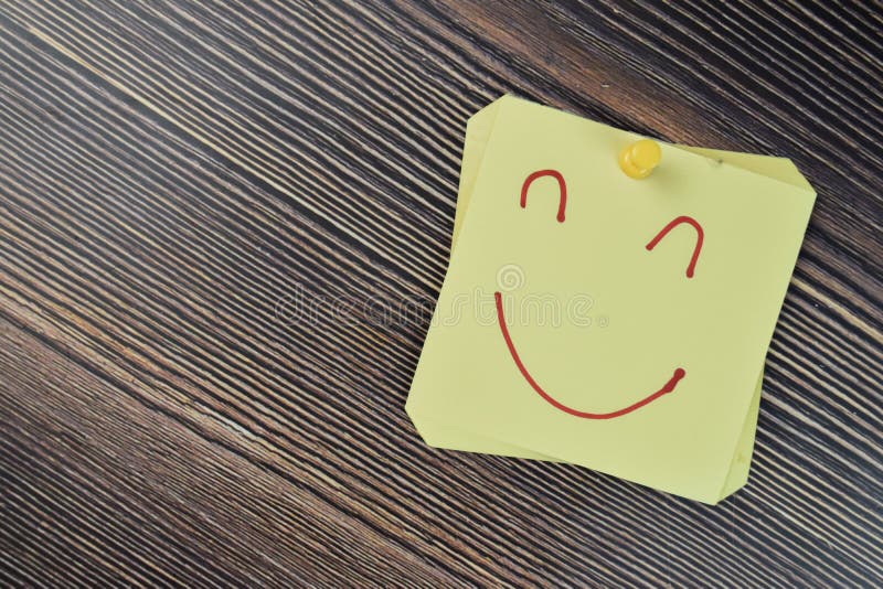 Concept of Funny Smiley Face Write on Sticky Notes Isolated on Wooden ...