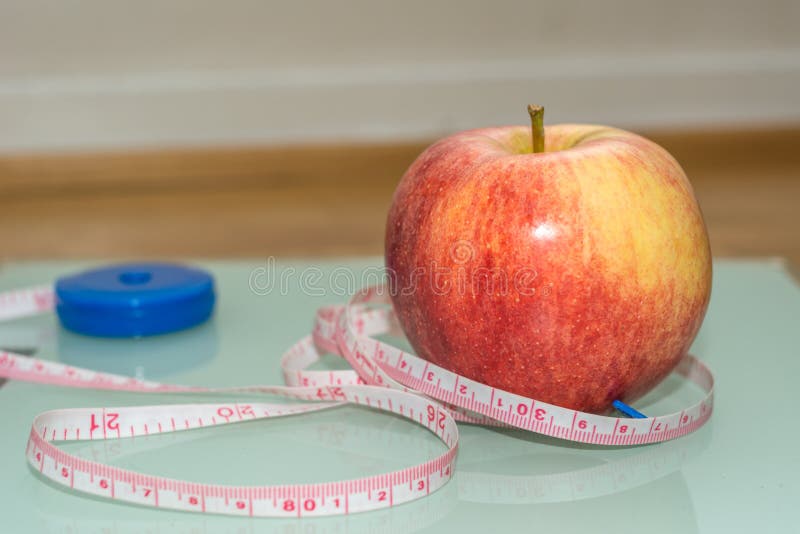 Concept - Getting in Shape, Measuring Tape, Apple, Scale Stock Photo ...