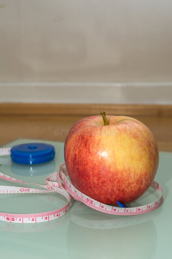 Concept - Getting in Shape, Measuring Tape, Apple, Scale Stock Image ...