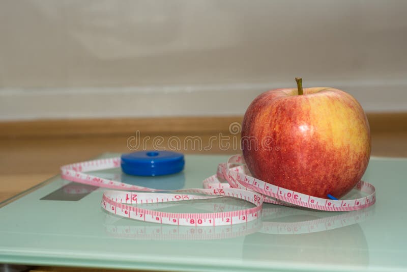 Concept - Getting in Shape, Measuring Tape, Apple, Scale Stock Photo ...