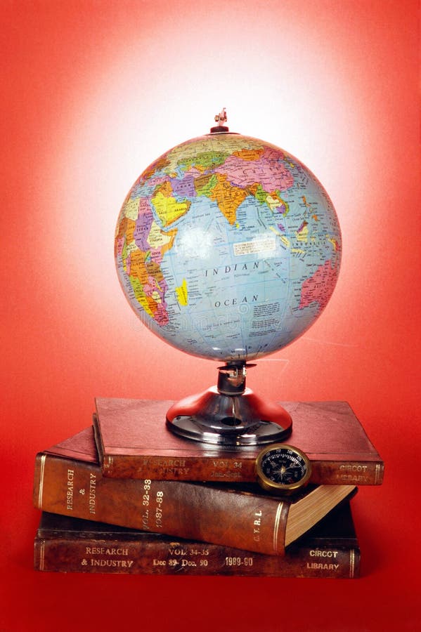 Globe on books stock image. Image of ocean, search, vertical - 348651947