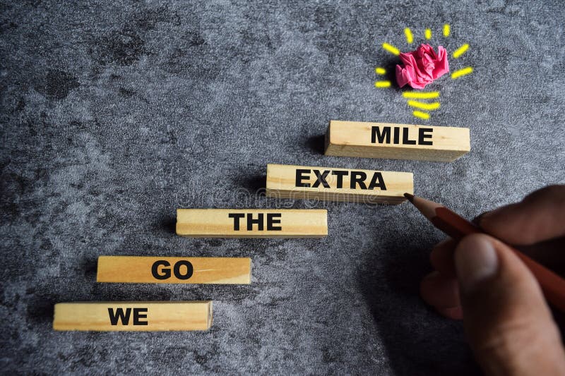 Concept of we Go the Extra Mile Symbol. Wooden Blocks Stacking As Step ...