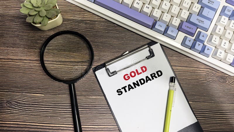 Concept of Gold Standard Write on Paperwork Isolated on Wooden Table ...