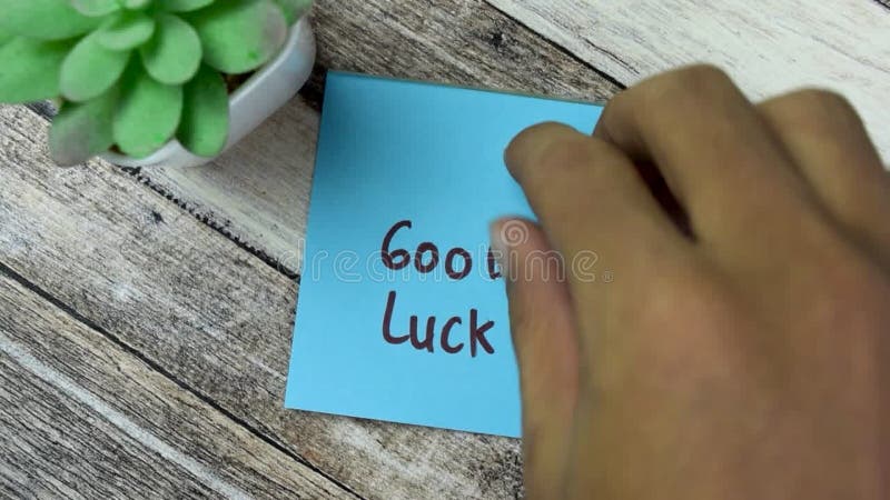 Concept of Good Luck! Write on Sticky Notes Isolated on Wooden Table ...