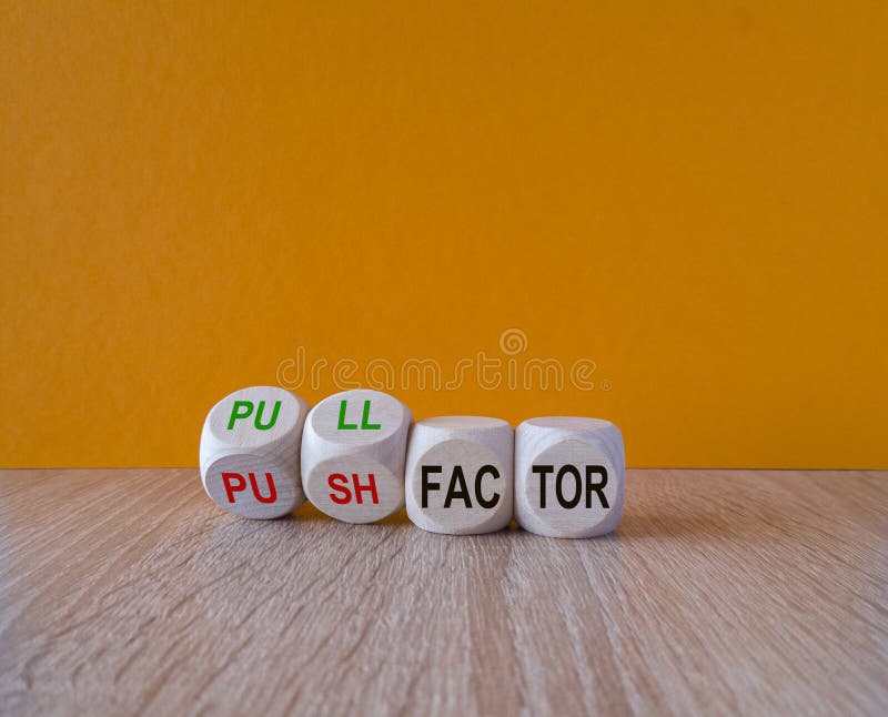 Concept Green Word Pull Factor and Push Factor on Wooden Cubes ...