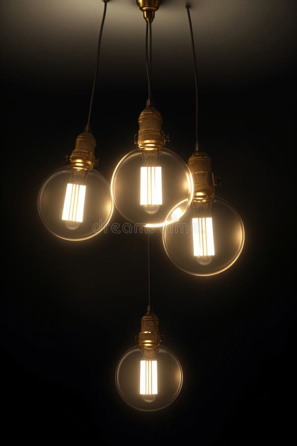 A Group of Light Bulbs Hanging from a Ceiling. Generative AI Stock ...