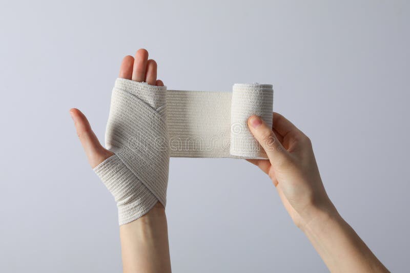 Concept of Hand Injury Help with Elastic Bandage Stock Image - Image of ...