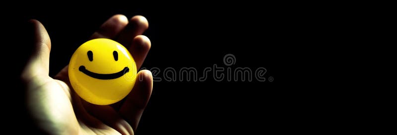 The Concept of Happiness, Emoji Smiles in the Palms, Dark Background ...