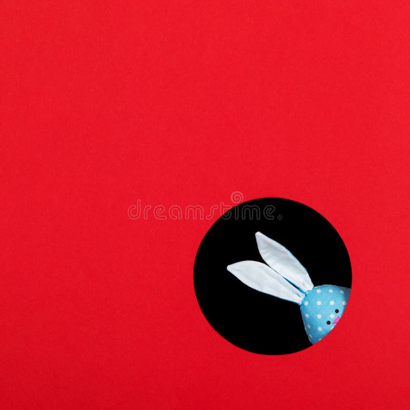 The Concept, Happy Easter, Eared Blue Rabbit Peeps Out of the Hole on ...