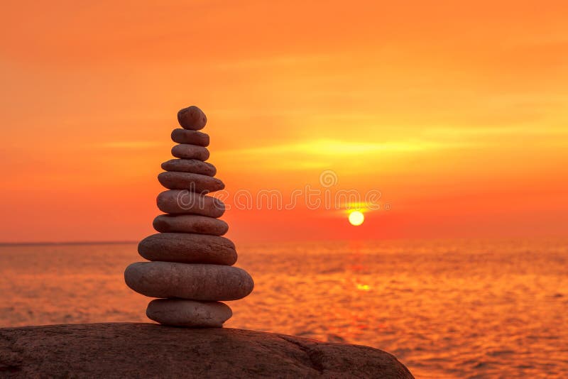 Concept of Harmony and Balance. Rock Zen on Sunset Background. Stock ...