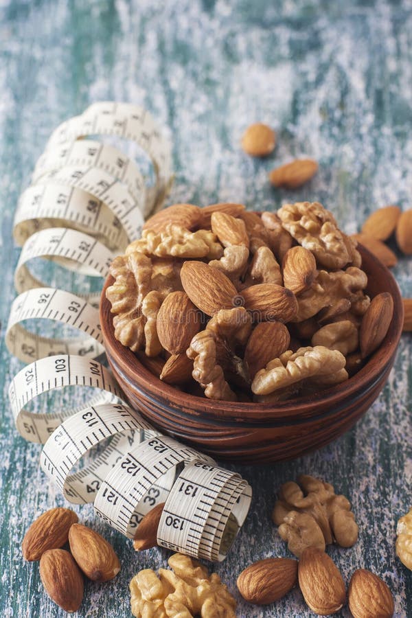 The Concept of a Healthy Lifestyle, Nuts and Measuring Meter Stock ...