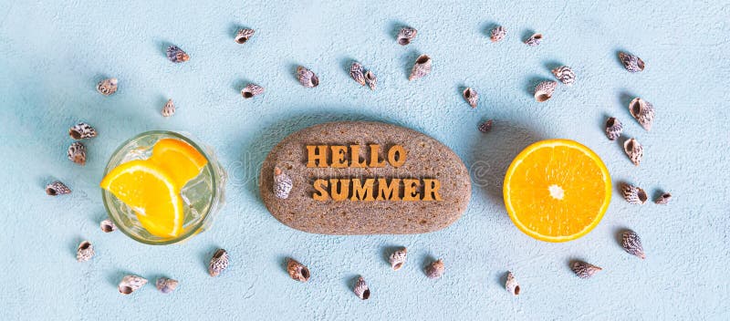 Concept Hello Summer Text on Stone, Cocktail, Orange and Seashells on ...