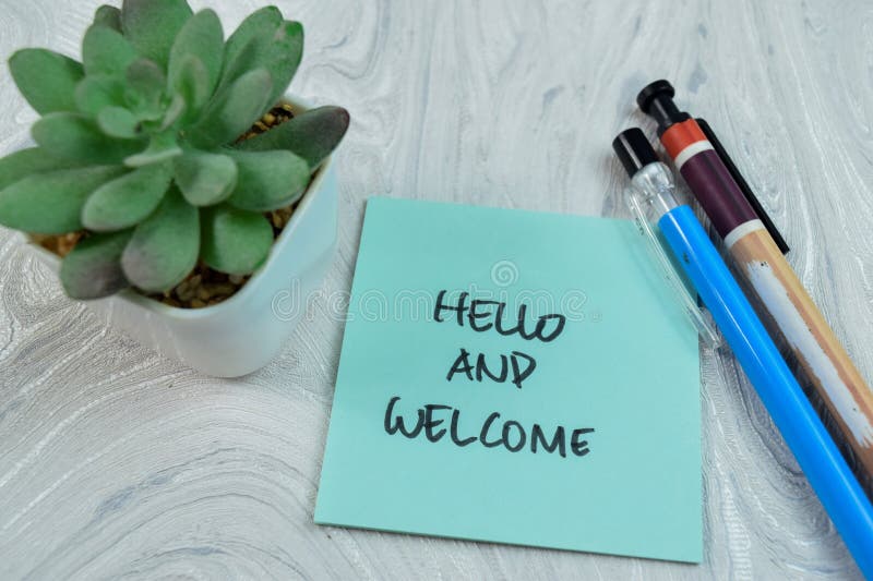 Concept of Hello and Welcome Write on Sticky Notes Isolated on Wooden ...