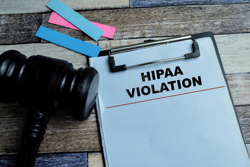 Concept of HIPAA Violation Write on Paperwork Isolated on Wooden ...