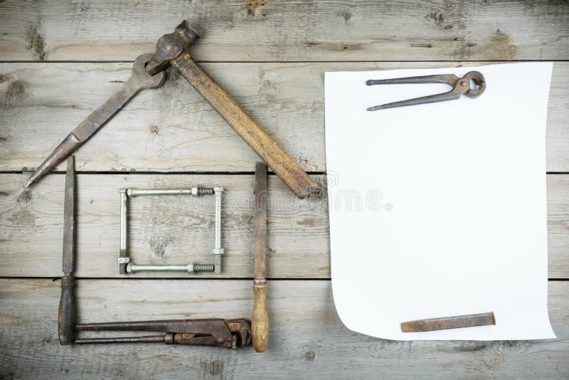 The Concept of a House Under Construction. Old Wooden Desktop. Old ...