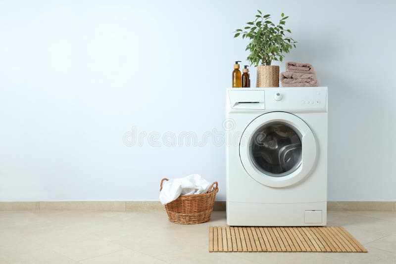 Concept of Housework with Washing Machine Against White Wall Stock ...