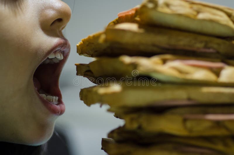 Girl devouring a pizza stock photo. Image of pizza, brunette - 23361640