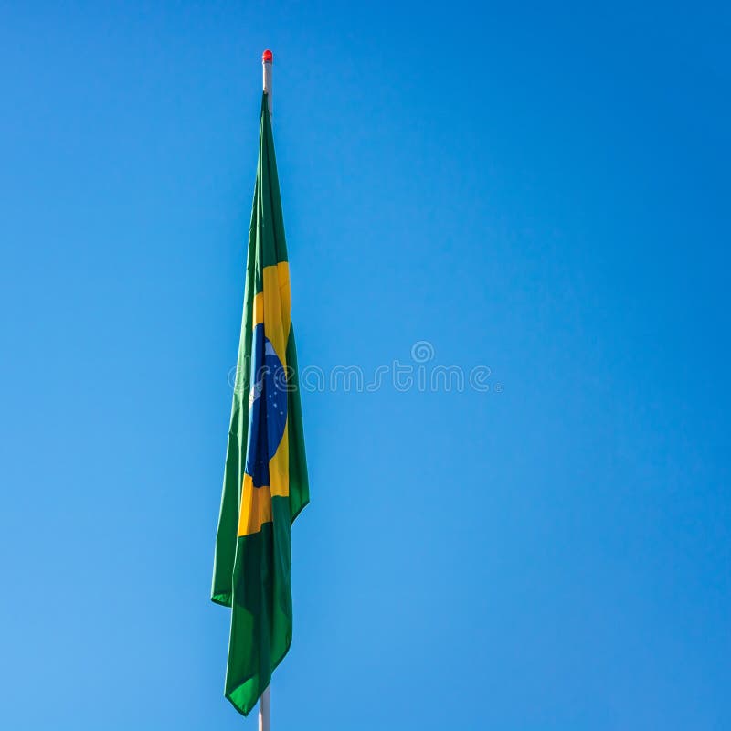 Brazilian Flag on Pole without Wind in Front of Blue Sky Stock Photo ...