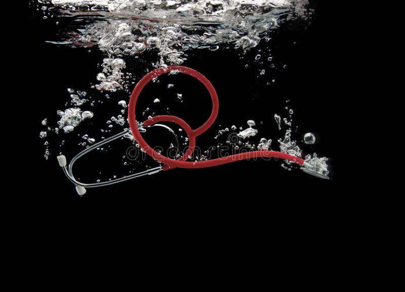 Red Stethoscope Sinking Under WaterÂ Stock Photo - Image of space ...
